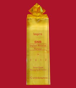 Smith-&-Nephew-Award-for-Implant-Material-Partner - Impro Precision